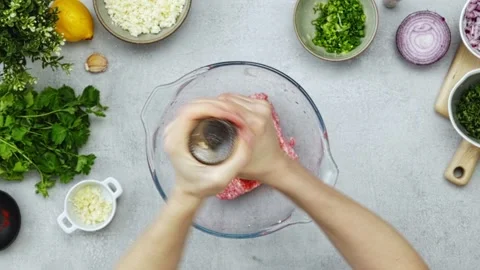 Crop person adding spices into minced me... | Stock Video | Pond5