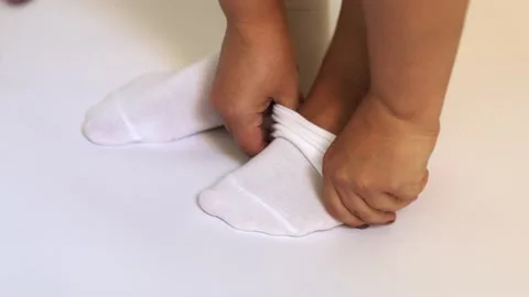 Woman Taking Off Socks Stock Videos – Royalty-Free HD & 4K Videos
