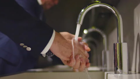 Cropped shot of men in suit washing hand... | Stock Video | Pond5