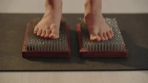Cropped view of barefoot woman steps on ... | Stock Video | Pond5