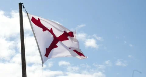 Cross of burgundy flying in the wind 15t... | Stock Video | Pond5