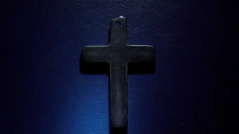 cross on a dark blue background | Stock Video | Pond5
