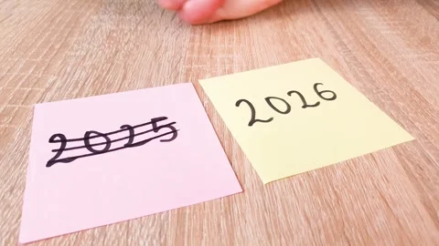 Cross out 2025 next to 2026 on paper wit... | Stock Video | Pond5