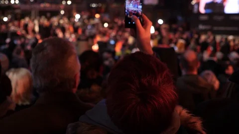 Crowd and fans taking photos at a red ca... | Stock Video | Pond5