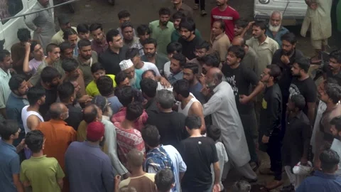 Crowd arguing fighting on street india p... | Stock Video | Pond5