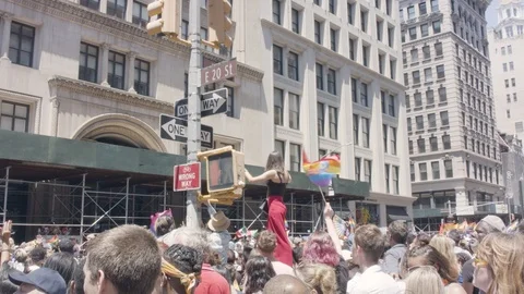 Crowd cheering at the Pride parade in Ne... | Stock Video | Pond5