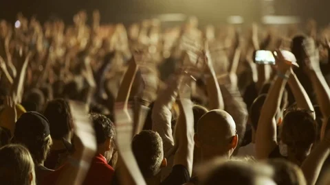 Crowd of fans cheering at open-air music... | Stock Video | Pond5