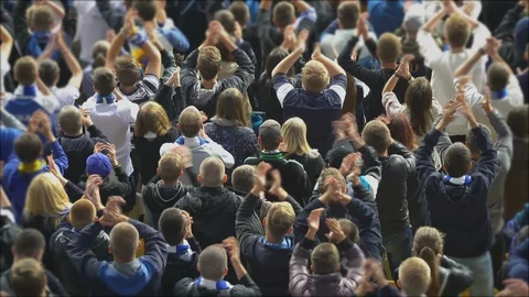 Crowd of football fans clapping hands at... | Stock Video | Pond5