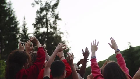 Crowd of friends cheerfully dancing on a... | Stock Video | Pond5