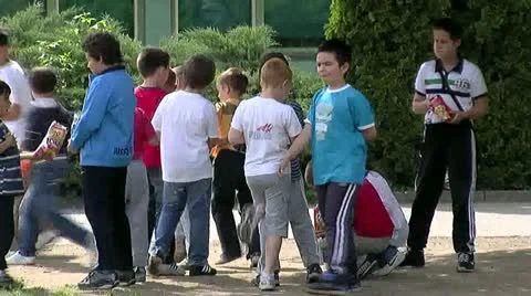Crowd of happy kids are playing in schoo... | Stock Video | Pond5