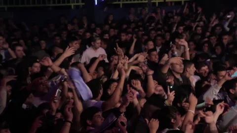 Crowd Having Fun During a Concert At A D... | Stock Video | Pond5