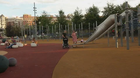 Crowd of kids having fun on playground, ... | Stock Video | Pond5
