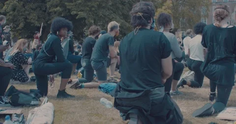 Crowd kneeling in respect at Black Lives... | Stock Video | Pond5