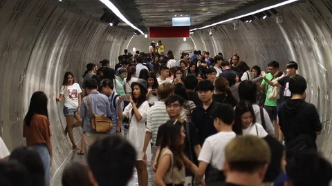 Crowd in the MRT subway connector tunnel... | Stock Video | Pond5