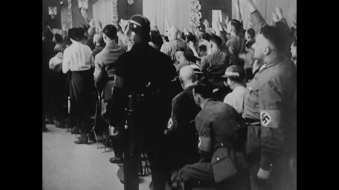 Crowd at Nazi rally stands up and does t... | Stock Video | Pond5