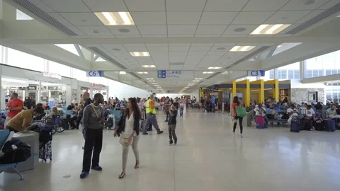Crowd of people in the airport terminal ... | Stock Video | Pond5
