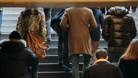 Crowd of people going up the stairs to t... | Stock Video | Pond5