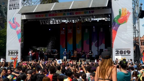 Crowd of people listening to a band play... | Stock Video | Pond5
