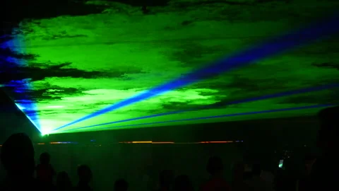 Crowd of people looking at light laser s... | Stock Video | Pond5