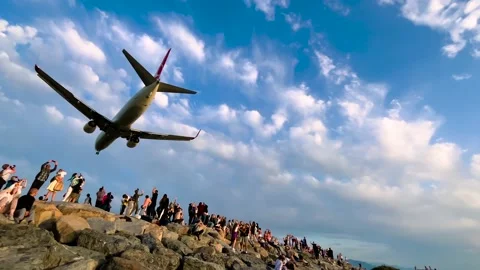 Crowd of people meets the arriving airpl... | Stock Video | Pond5
