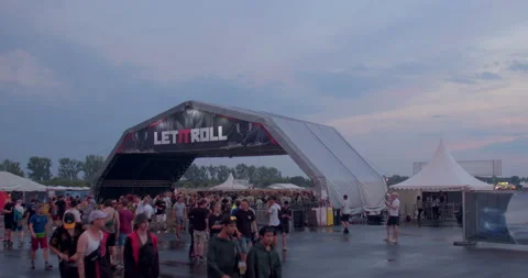 A crowd of people moves against the back... | Stock Video | Pond5