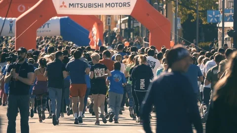 Crowd of people running marathon in slow... | Stock Video | Pond5