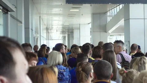 A crowd of people is waiting in line for... | Stock Video | Pond5