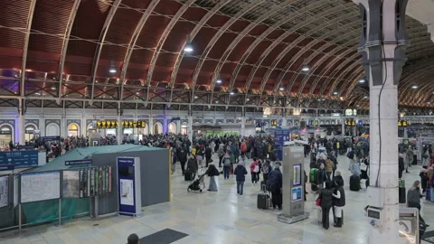 Crowd of people waiting for trains at Lo... | Stock Video | Pond5