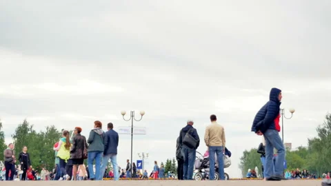 Crowd of people walking around the squar... | Stock Video | Pond5