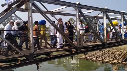 Crowd of people walking in a bridge Kolk... | Stock Video | Pond5