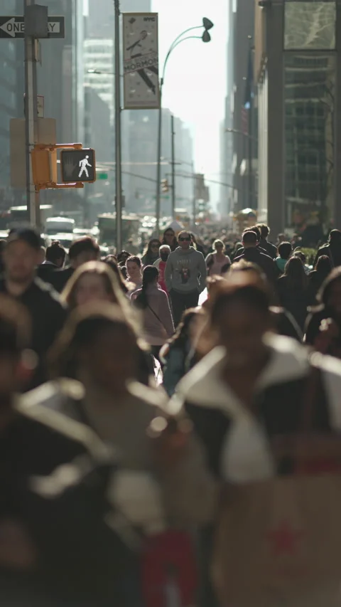 Crowd of people walking street backlit b... | Stock Video | Pond5