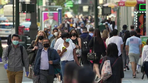 Crowd of people walking street mask mask... | Stock Video | Pond5