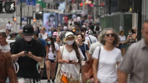 Crowd of people walking street mask mask... | Stock Video | Pond5