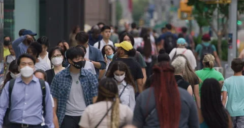Crowd of people walking street mask mask... | Stock Video | Pond5