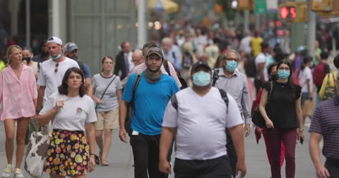 Crowd of people walking street mask mask... | Stock Video | Pond5