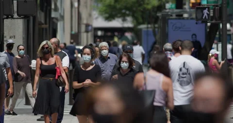 Crowd of people wearing mask masks walki... | Stock Video | Pond5