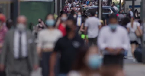 Crowd of people wearing mask masks walki... | Stock Video | Pond5