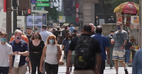 Crowd of people wearing mask masks walki... | Stock Video | Pond5