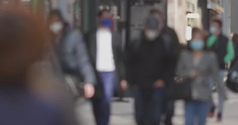 Crowd of people wearing mask masks walki... | Stock Video | Pond5