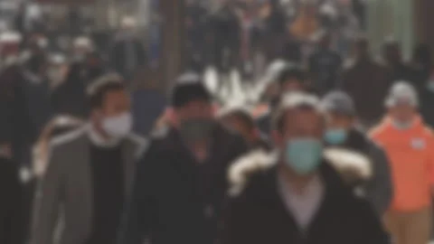 Crowd of people wearing mask masks walki... | Stock Video | Pond5
