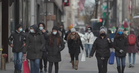 Crowd of people wearing mask masks walki... | Stock Video | Pond5