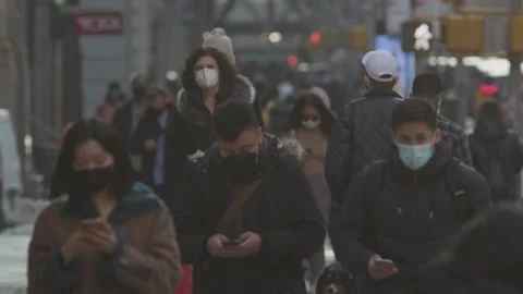 Crowd of people wearing mask masks walki... | Stock Video | Pond5