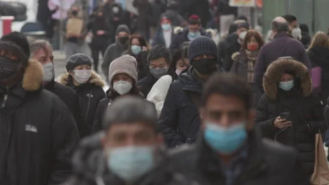 Crowd of people wearing mask masks walki... | Stock Video | Pond5