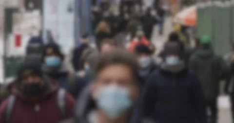 Crowd of people wearing mask masks walki... | Stock Video | Pond5