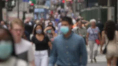 Crowd of people wearing mask masks walki... | Stock Video | Pond5