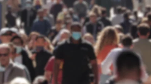 Crowd of people wearing mask masks walki... | Stock Video | Pond5