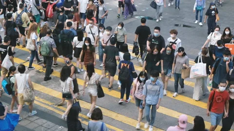 Crowd of people wearing medical face mas... | Stock Video | Pond5