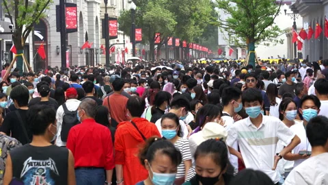 Crowd of people wearing surgical face ma... | Stock Video | Pond5