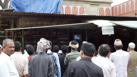 Crowd of poor working class Indian men w... | Stock Video | Pond5