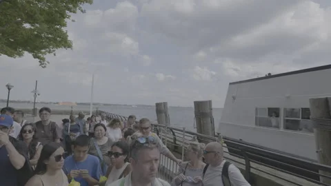 Crowd queueing for New York City tour bo... | Stock Video | Pond5